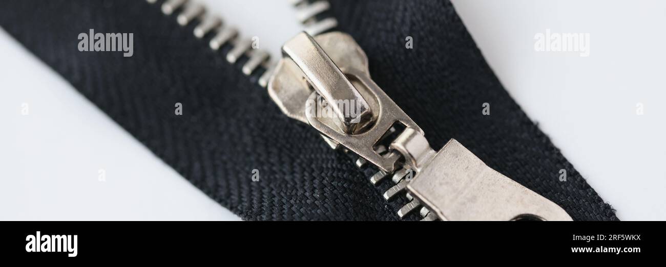 Metallic zipper isolated on white background Stock Photo - Alamy