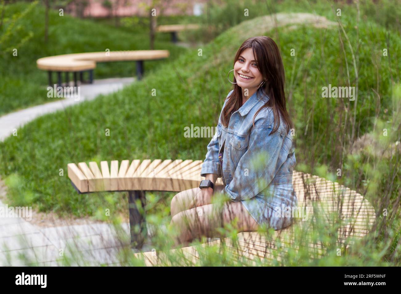 Side view portrait of extremely happy woman wearing denim jacket ...