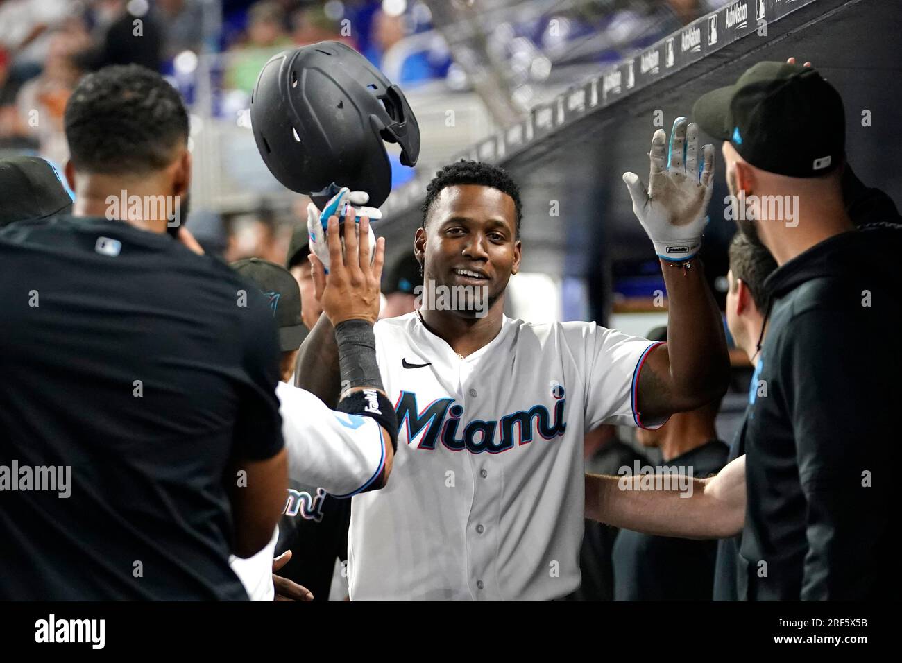 Miami Marlins' Jorge Soler is congratulated after hitting a two-run ...