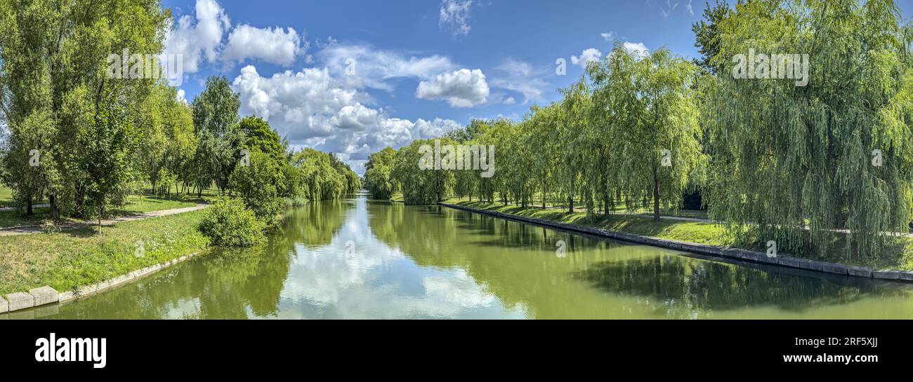 summer picturesque landscape with water canal in green park at sunny ...