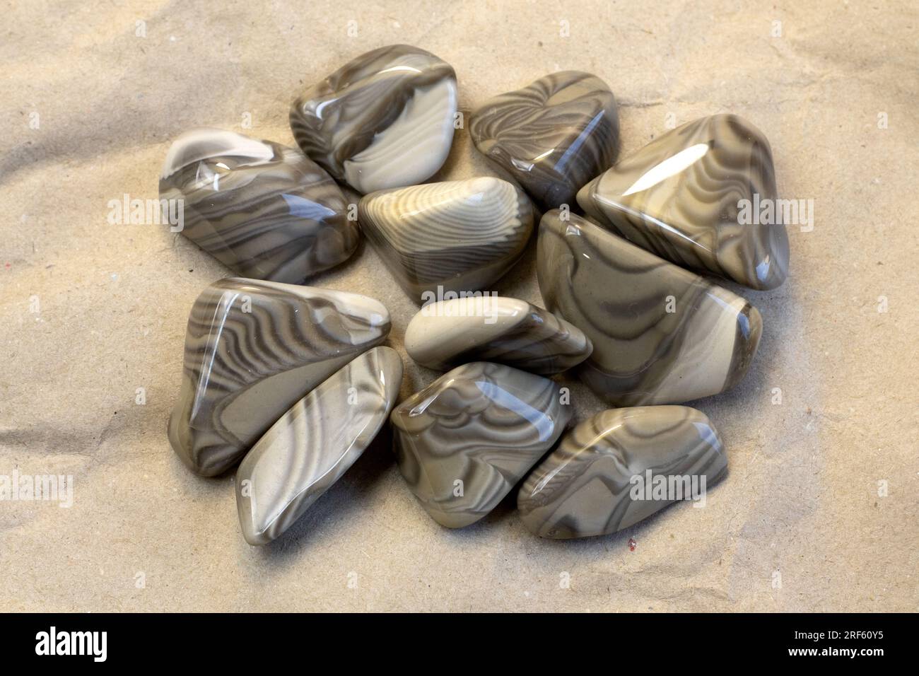 Macro mineral stone Flint on grey craft background close-up top view ...