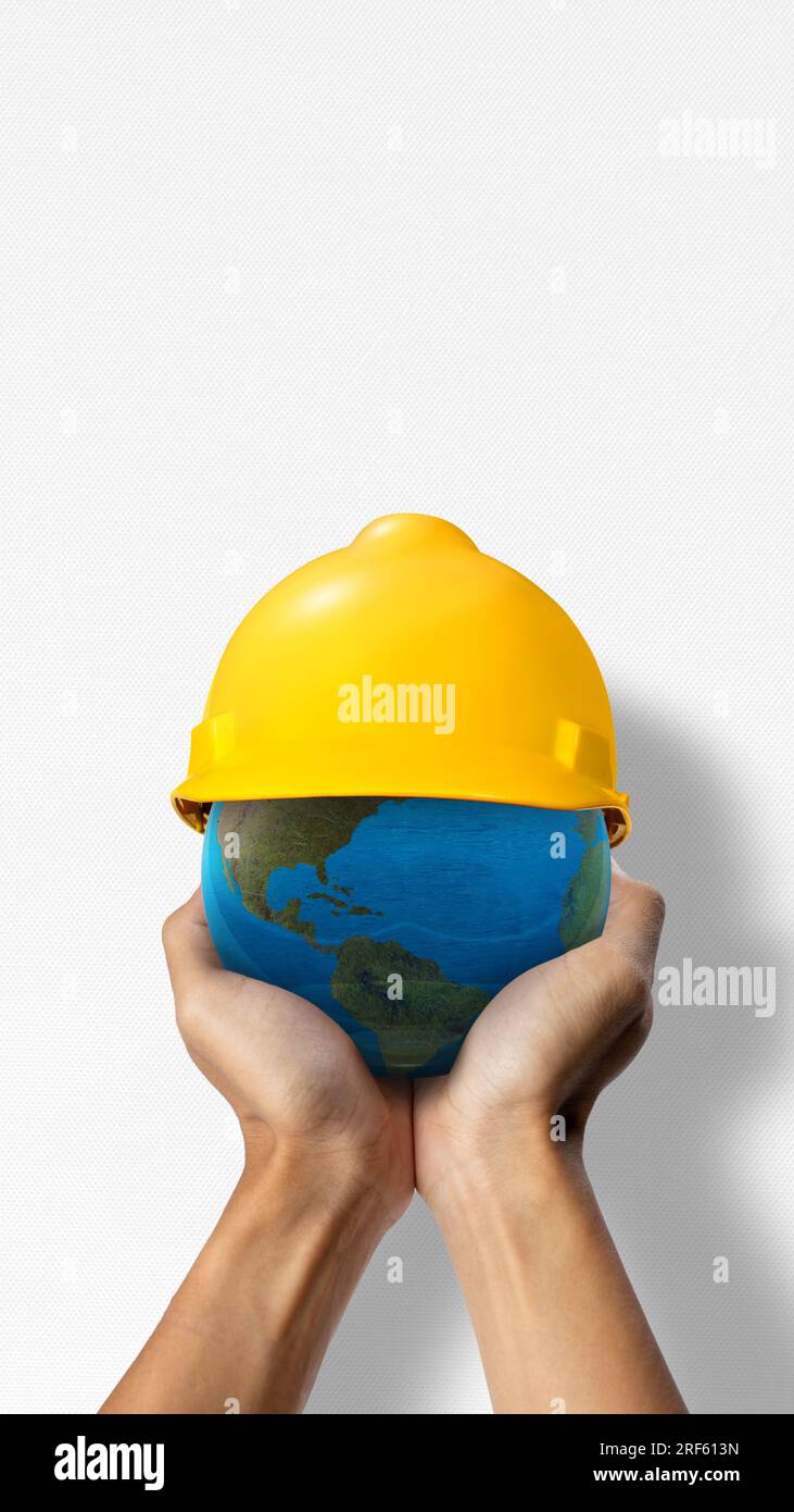 Globe with safety helmet. Labor day concept Stock Photo - Alamy