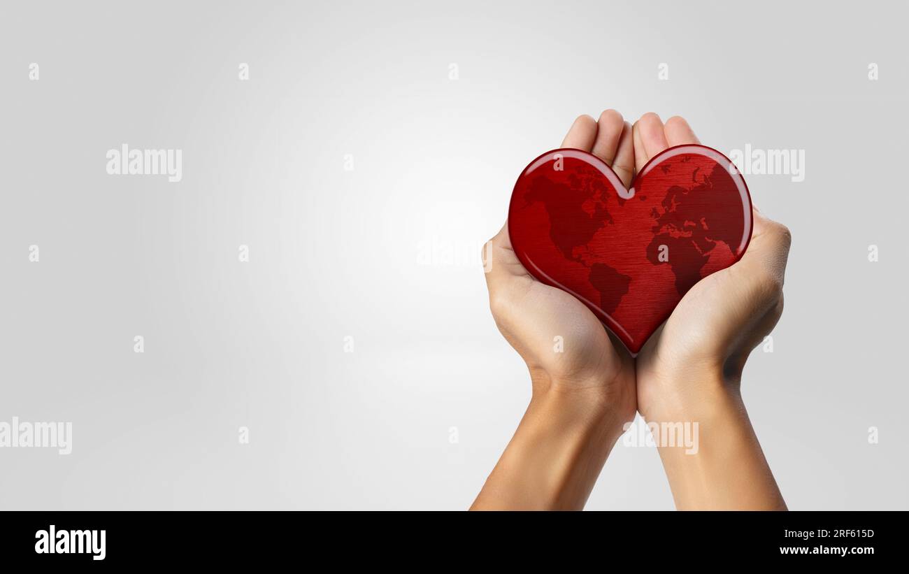 Human hand showing red heart. World heart day concept Stock Photo - Alamy