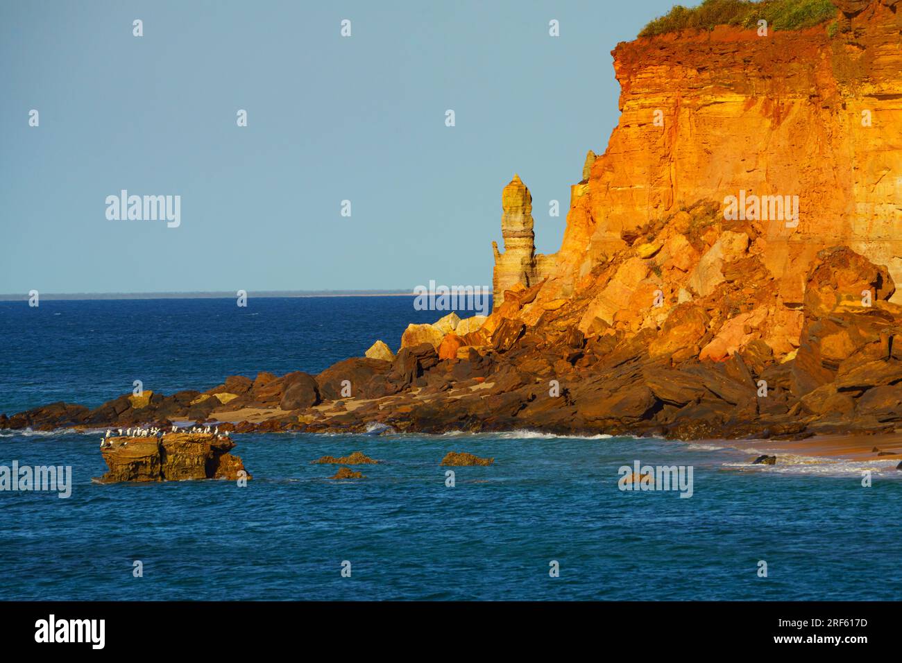 The chimney rock formation at the northern end of Chimney Beach at ...
