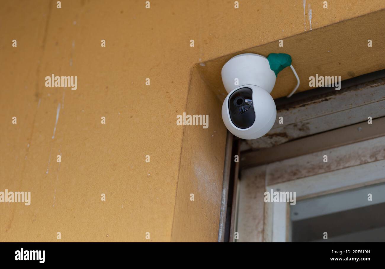 Security Camera, CCTV on location. Security camera on the wall in old ...