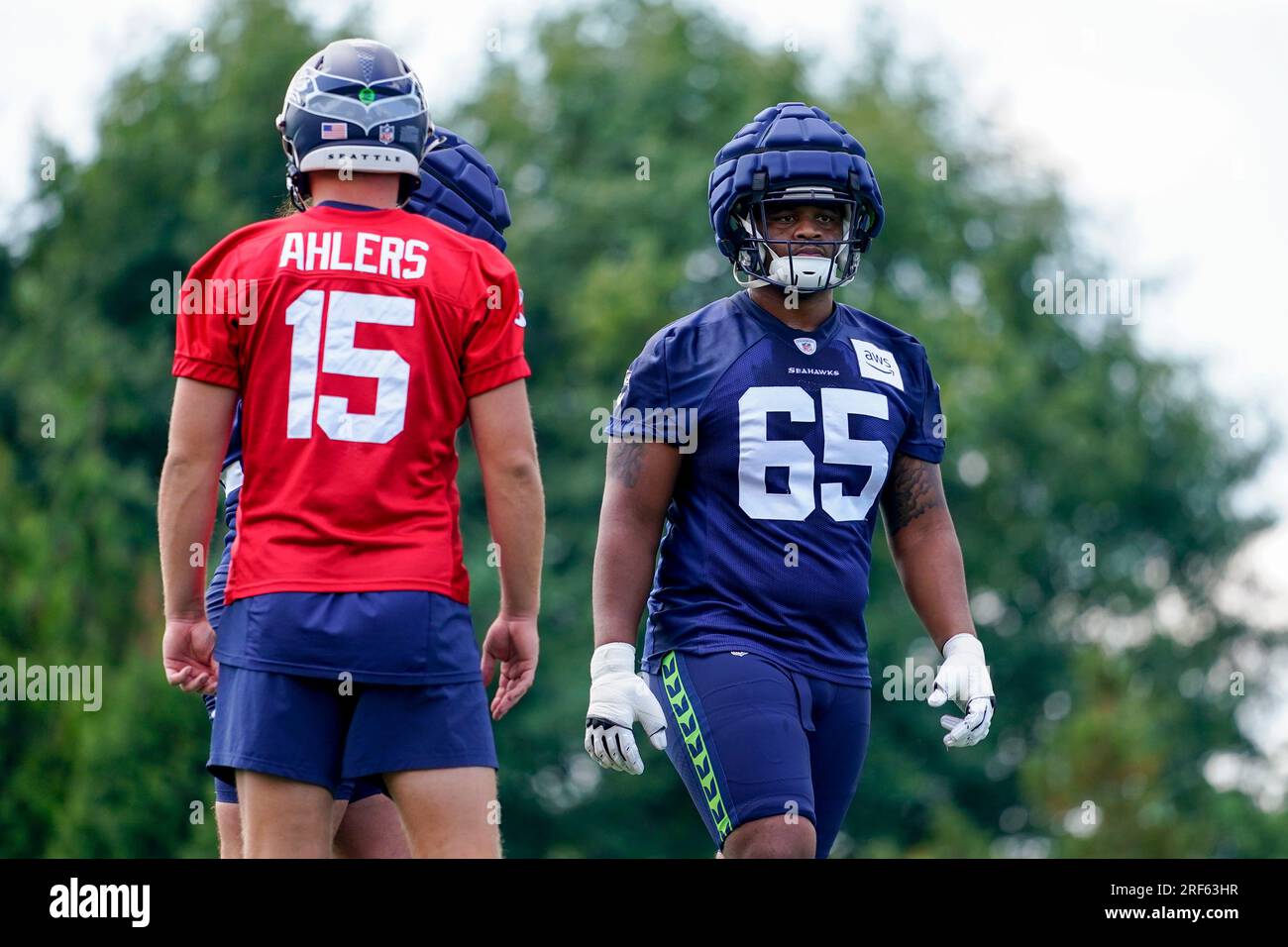 Seattle Seahawks quarterback Holton Ahlers (15) and guard Kendall ...