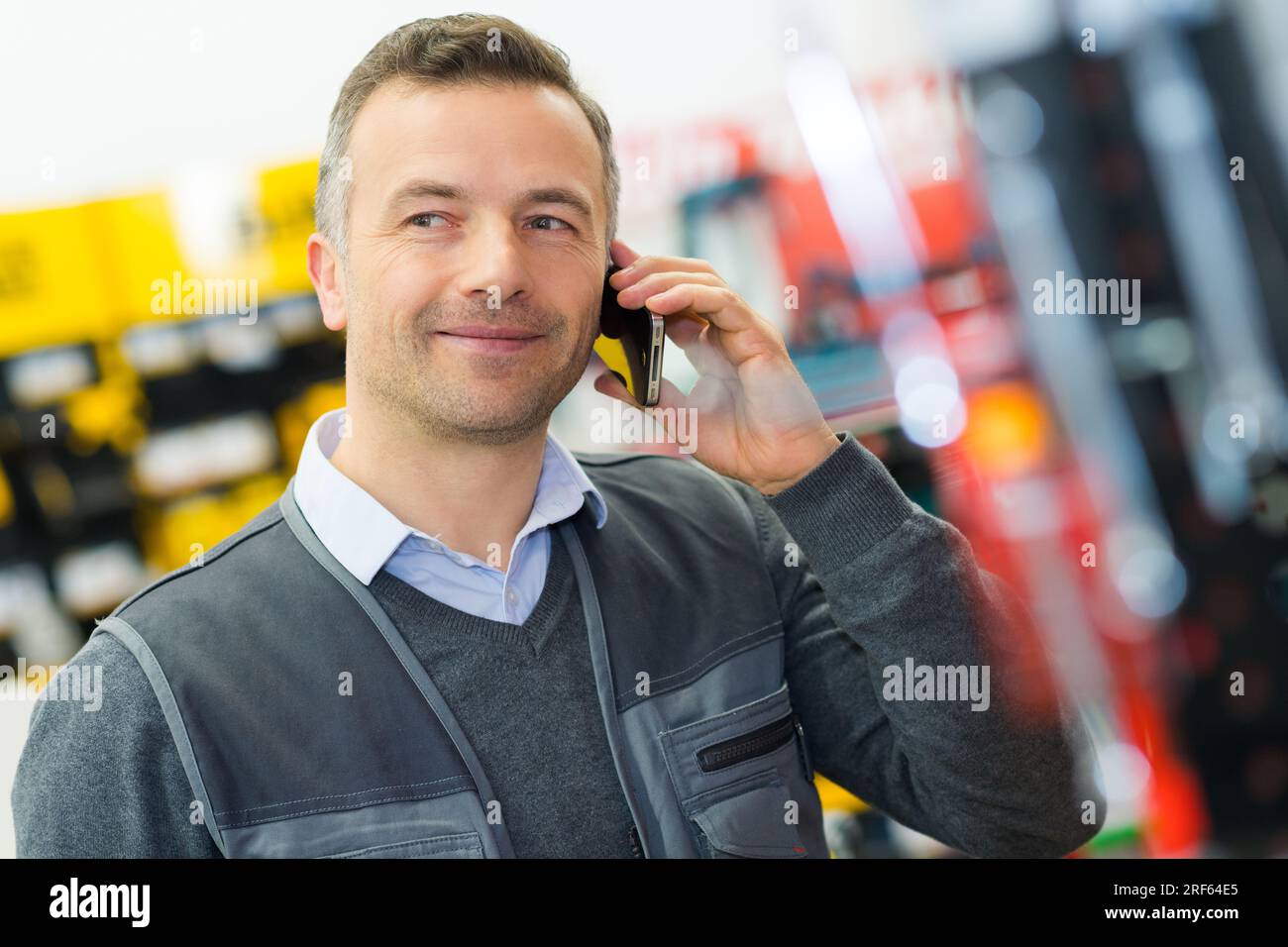 Handsome auto mechanic using hi-res stock photography and images - Alamy