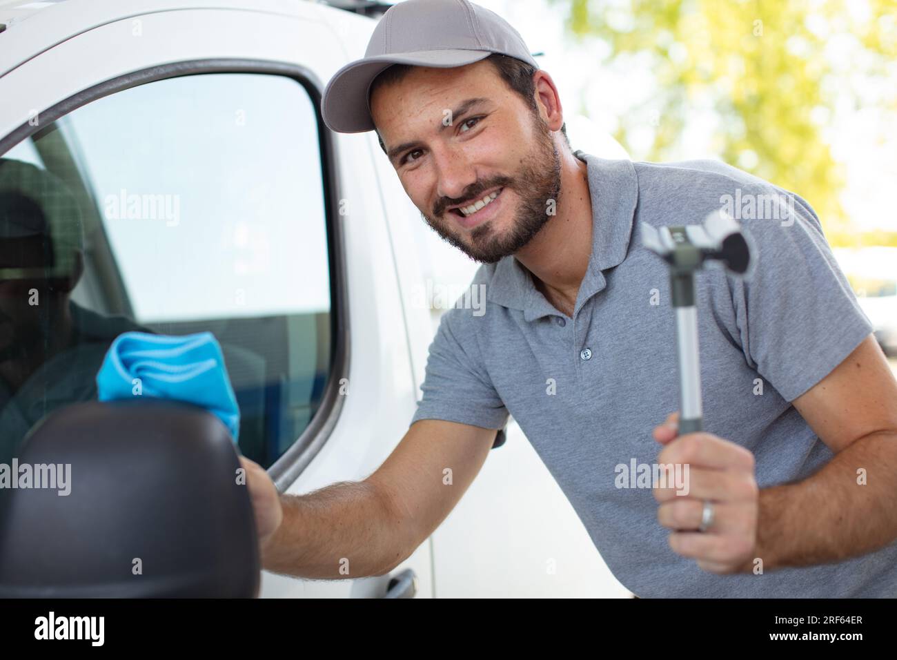 Man dusting car hi-res stock photography and images - Alamy