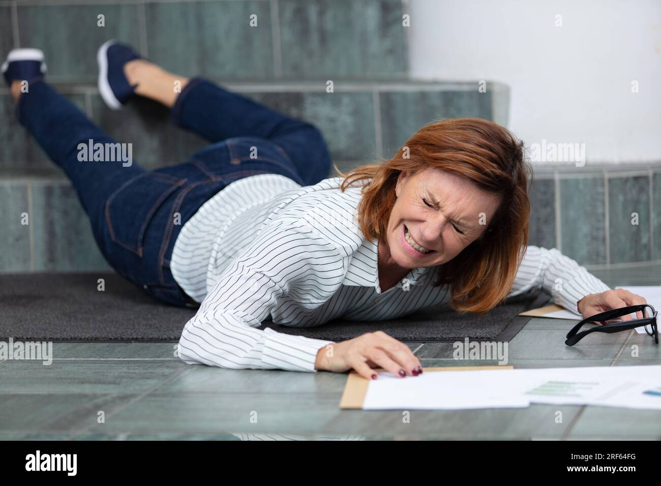 Tripping on stairs hi-res stock photography and images - Alamy