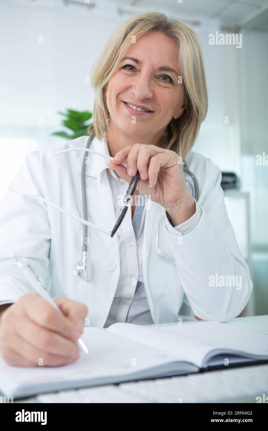 female doctor working at medical office Stock Photo - Alamy