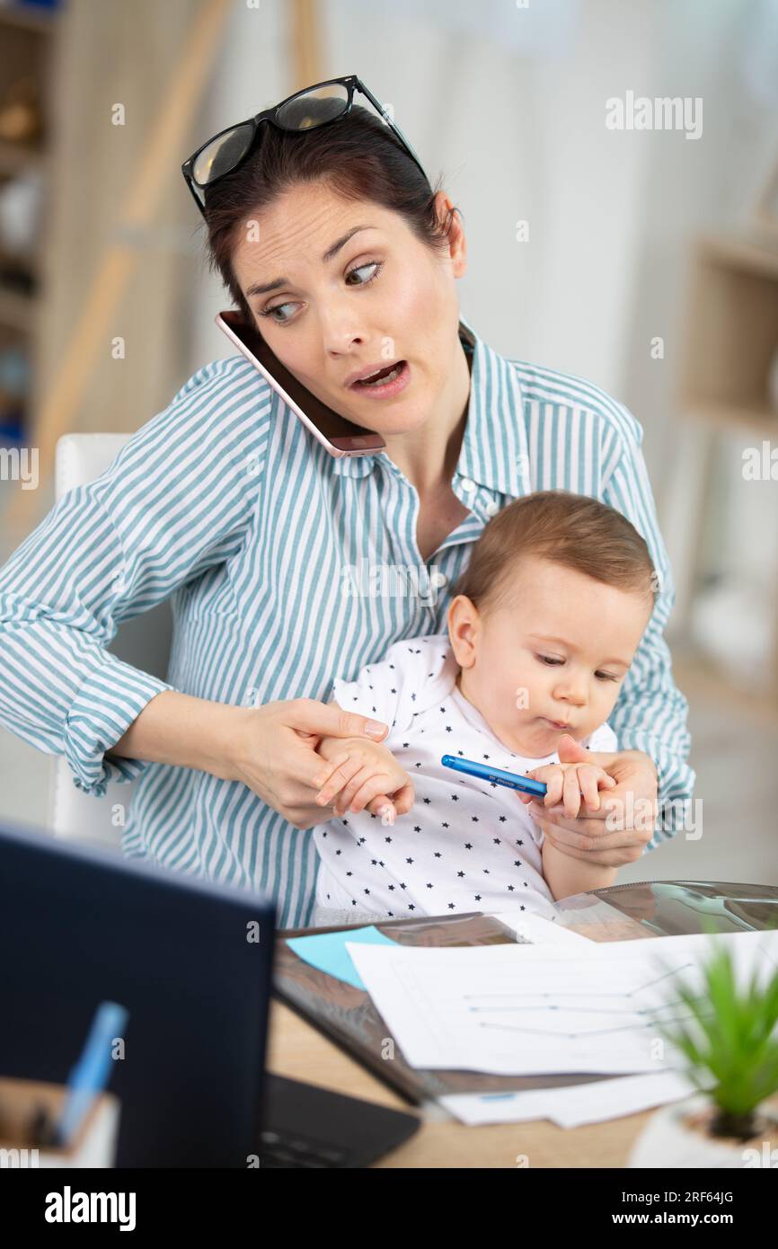 Mother telephone ignoring daughter hi-res stock photography and images ...