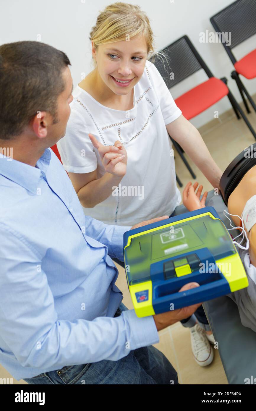 woman and man during first aid training Stock Photo - Alamy