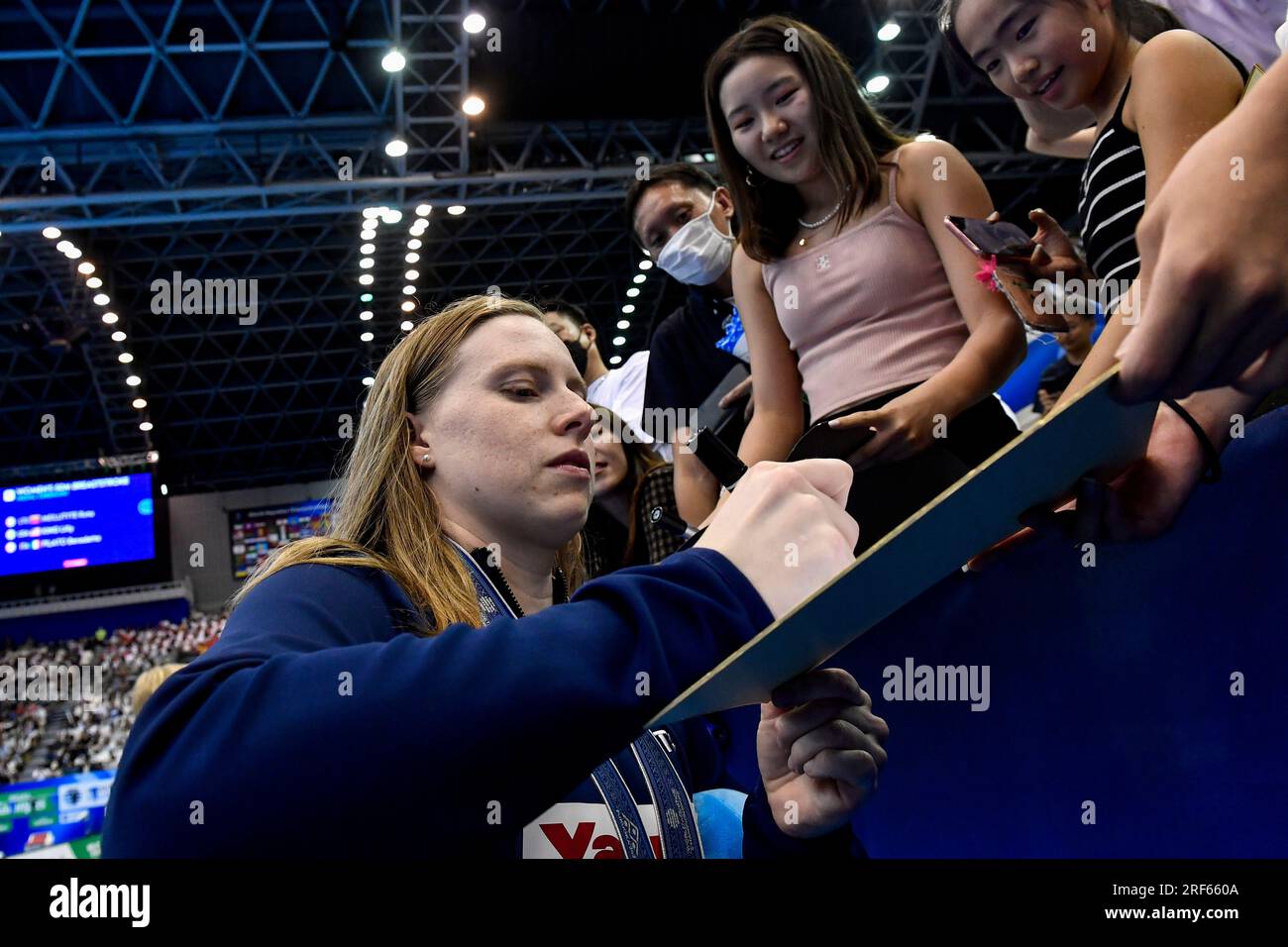 Lilly King of United States of America signs autographs after competing ...