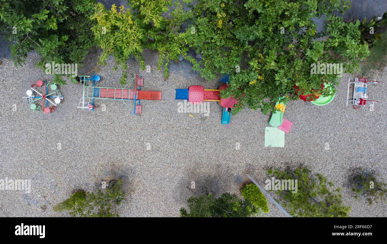Aerial view of the playground in the park. Playground at a public park ...