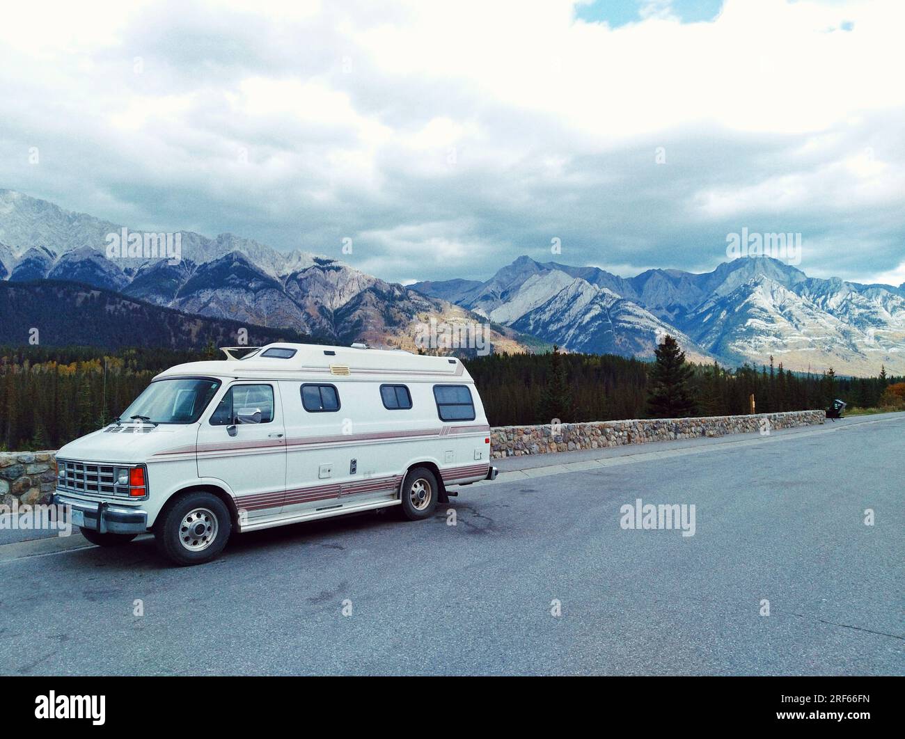 Parked van car vehicle on a side of highway road near Banff national ...