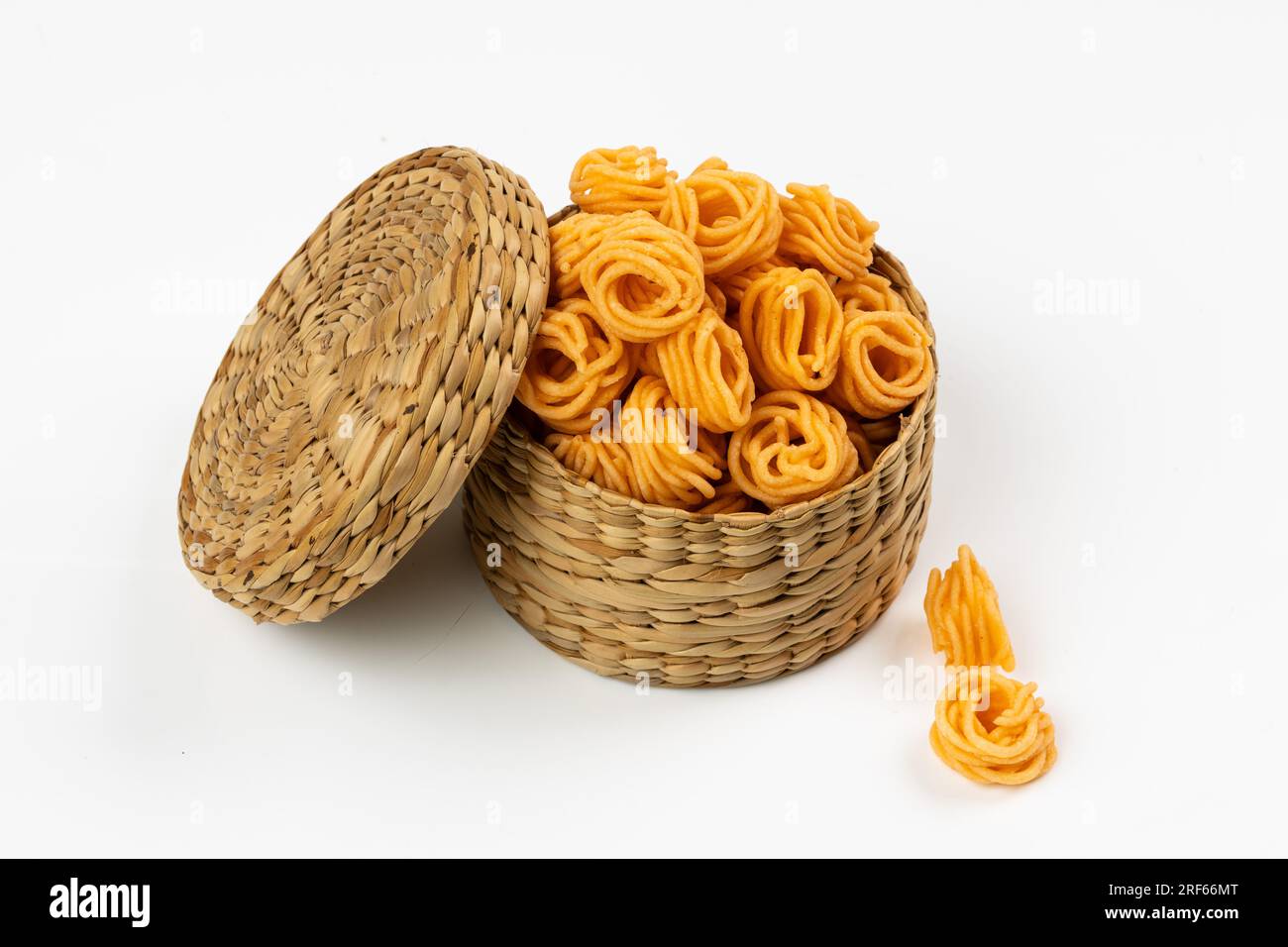 MURUKKU, Small spiral murukku which is very spicy and tasty, isolated ...