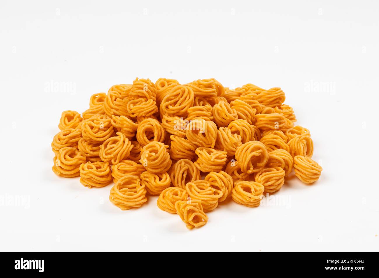 MURUKKU, Small spiral murukku which is very spicy and tasty, isolated ...