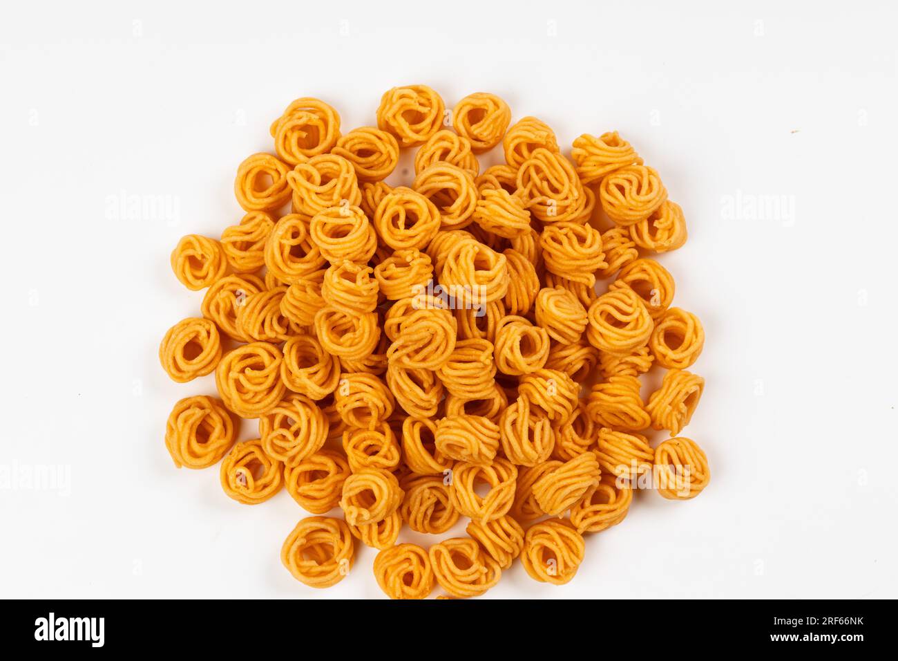 MURUKKU, Small spiral murukku which is very spicy and tasty, isolated ...