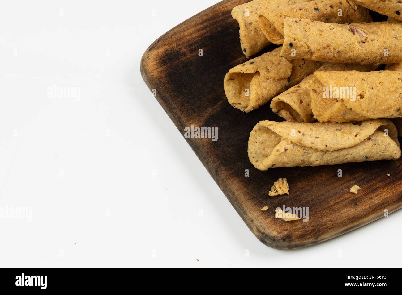 KUZHALAPPAM or MADAKKU APPAM, folded type Indian snack, isolated images ...