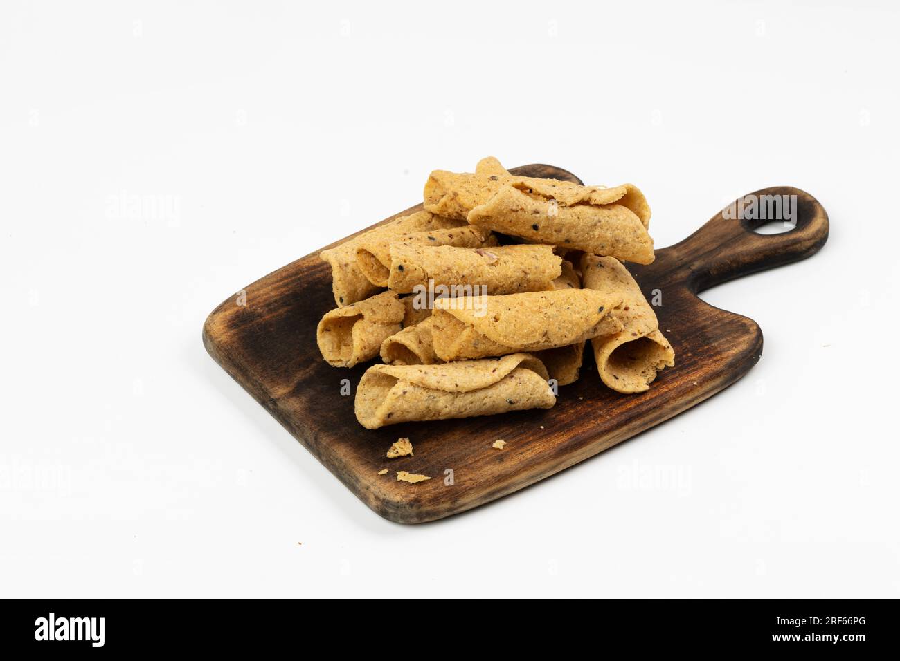 KUZHALAPPAM or MADAKKU APPAM, folded type Indian snack, isolated images ...