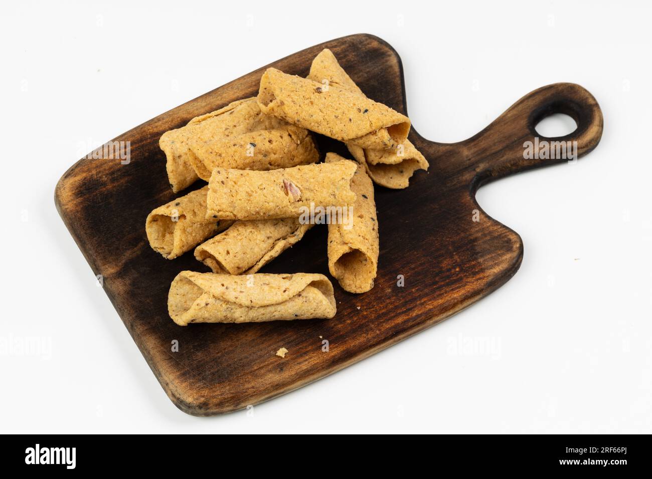 KUZHALAPPAM or MADAKKU APPAM, folded type Indian snack, isolated images ...