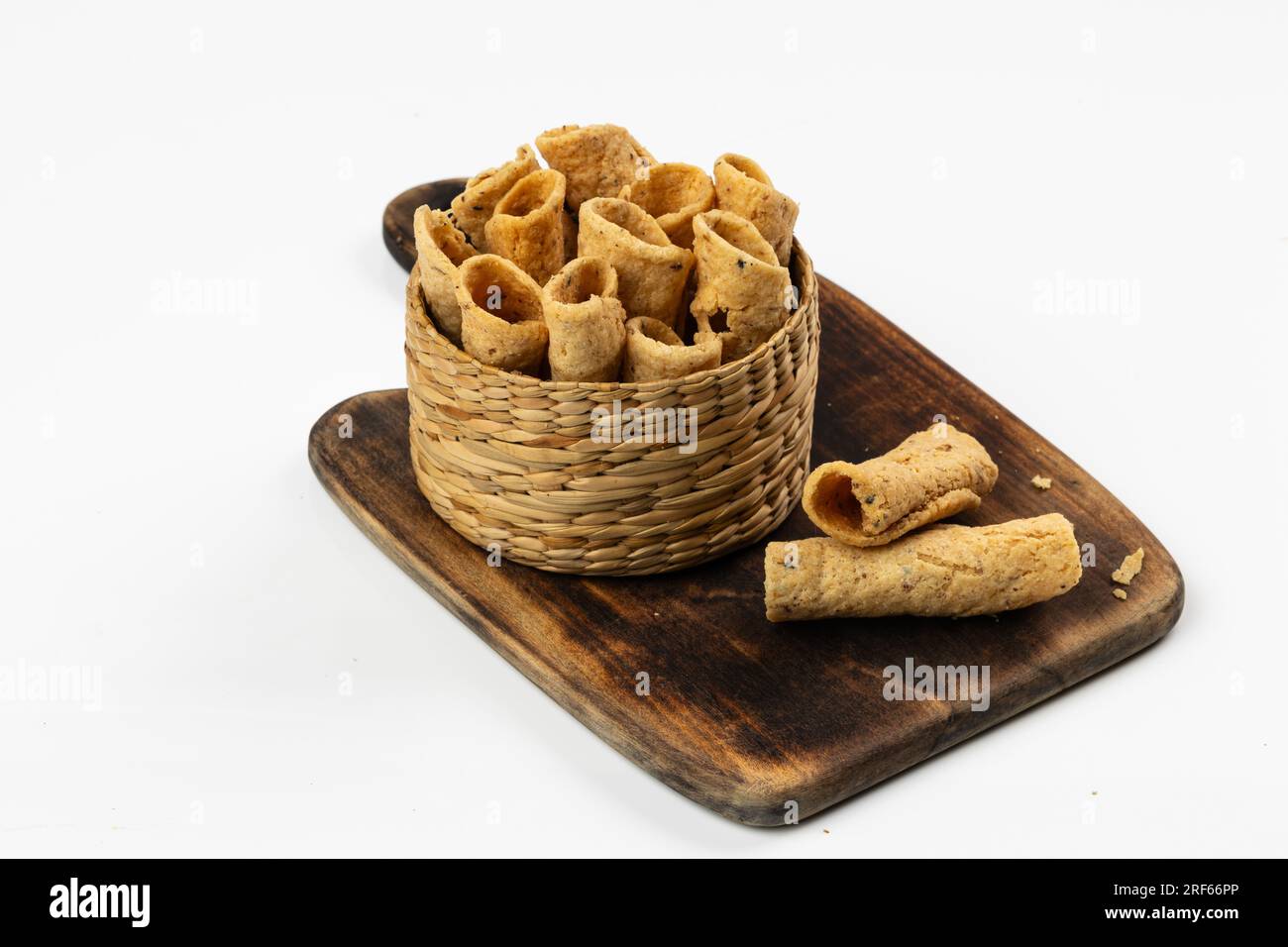 KUZHALAPPAM or MADAKKU APPAM, folded type Indian snack, isolated images ...