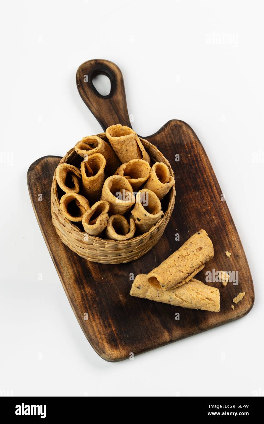 KUZHALAPPAM or MADAKKU APPAM, folded type Indian snack, isolated images ...