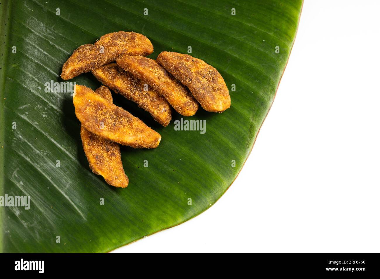 Sharkara Upperi or Sarkara Varatti, is a popular sweet snack from Kerala, isolated images with ...