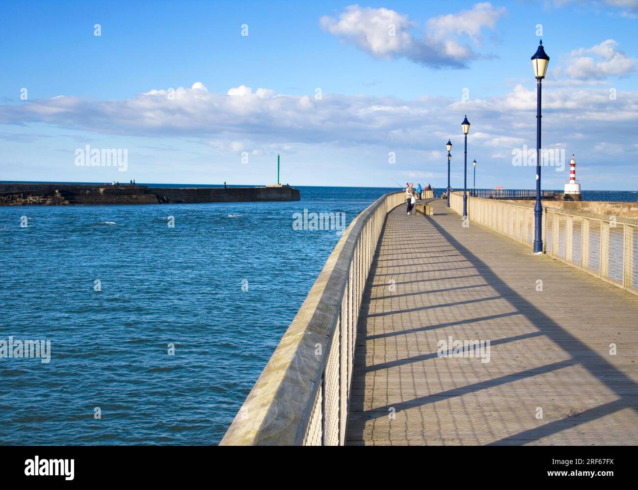 Amble pier and harbour entrance on the northumberland coast Stock Photo ...