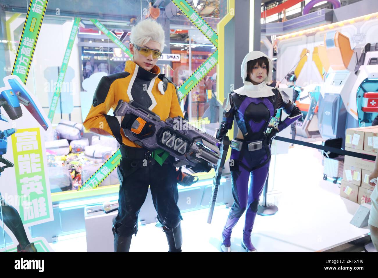 Shanghai, China. 01st Aug, 2023. Two shooting game character cosplayers ...