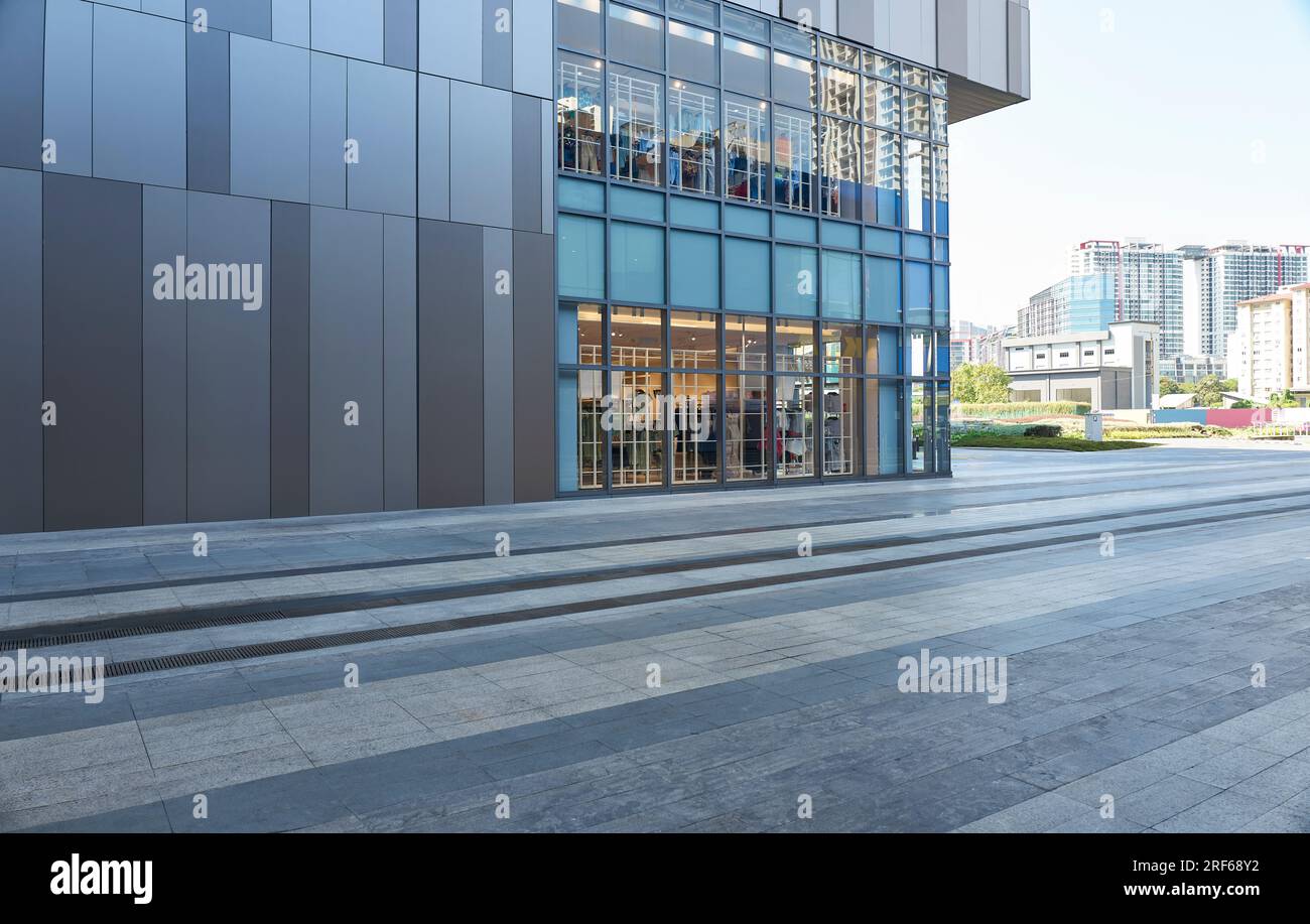 Pedestrian streets and exteriors of shopping mall buildings in the city ...