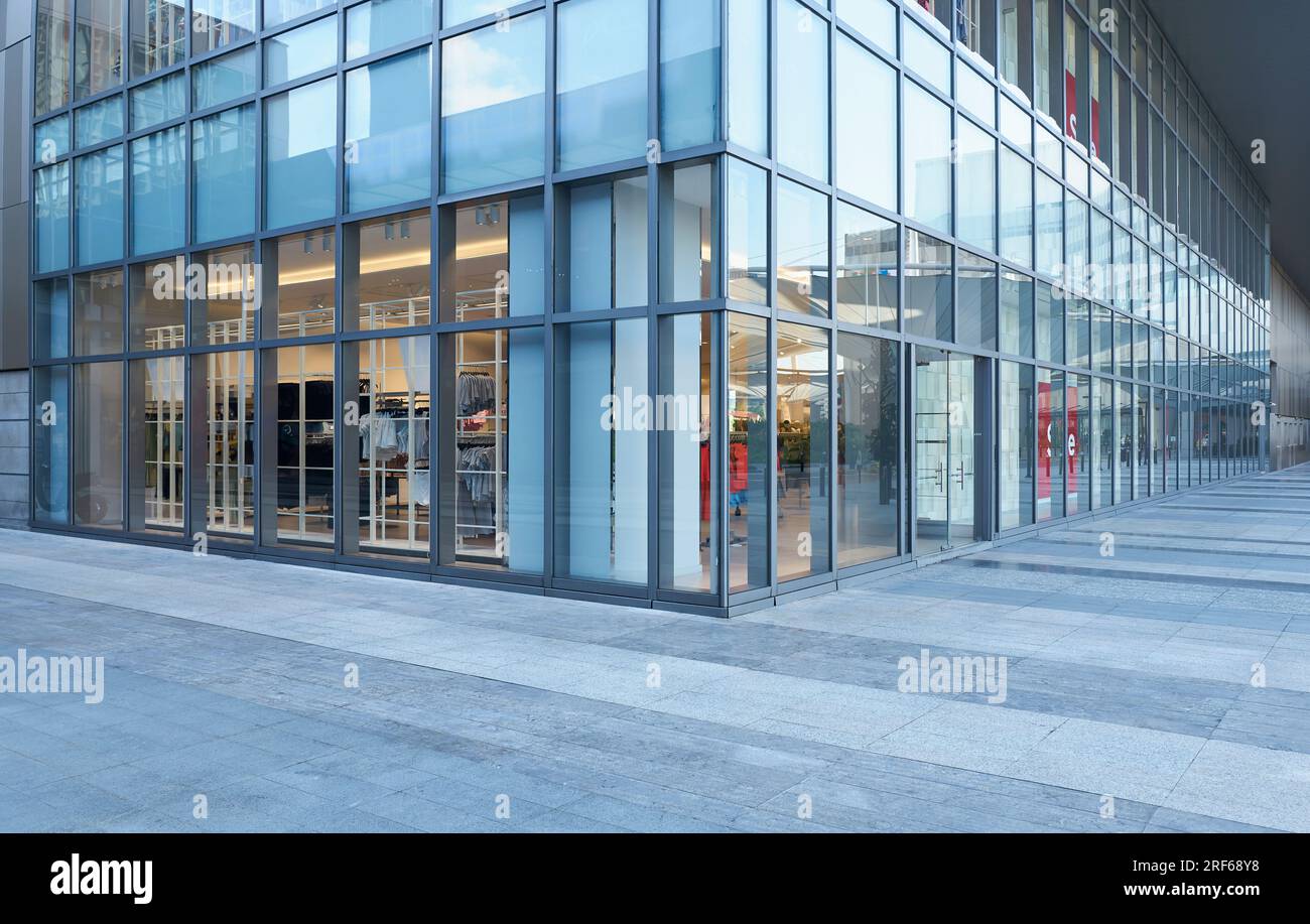 Pedestrian streets and exteriors of shopping mall buildings in the city ...
