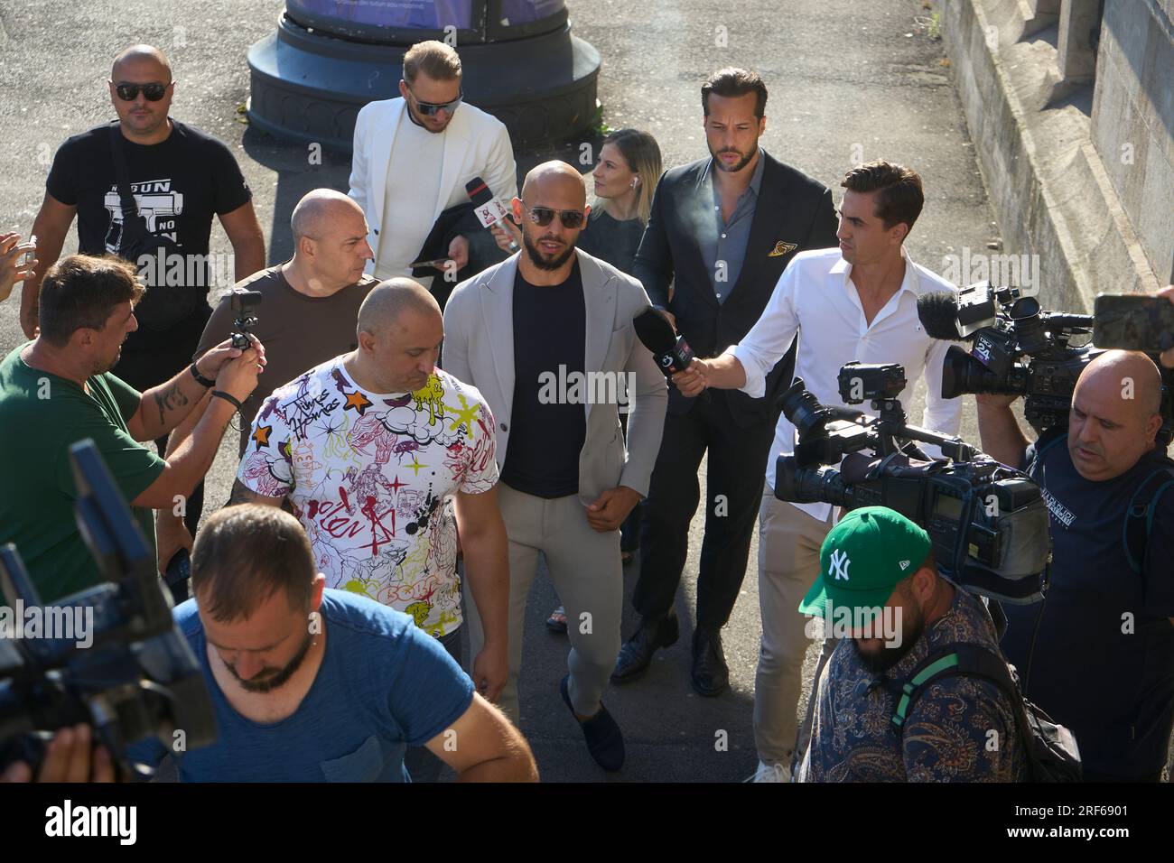 Bucharest, Romania. 1st August, 2023: Andrew Tate (C) and his brother ...