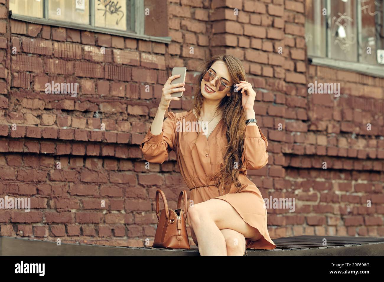 Hand using mirror screen hi-res stock photography and images - Alamy