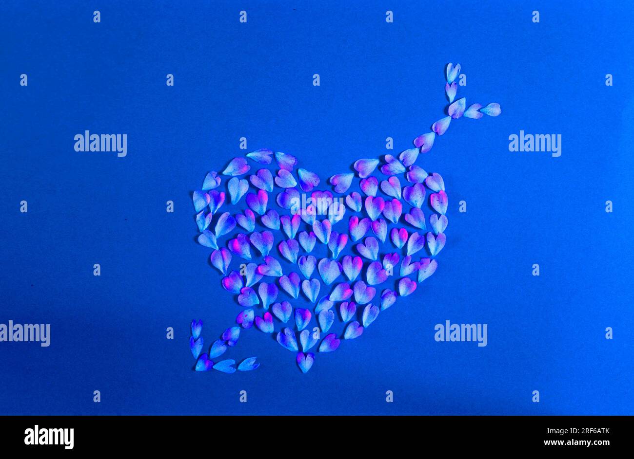 Heart made of many small hearts pierced with Cupid's arrow Tearing ...