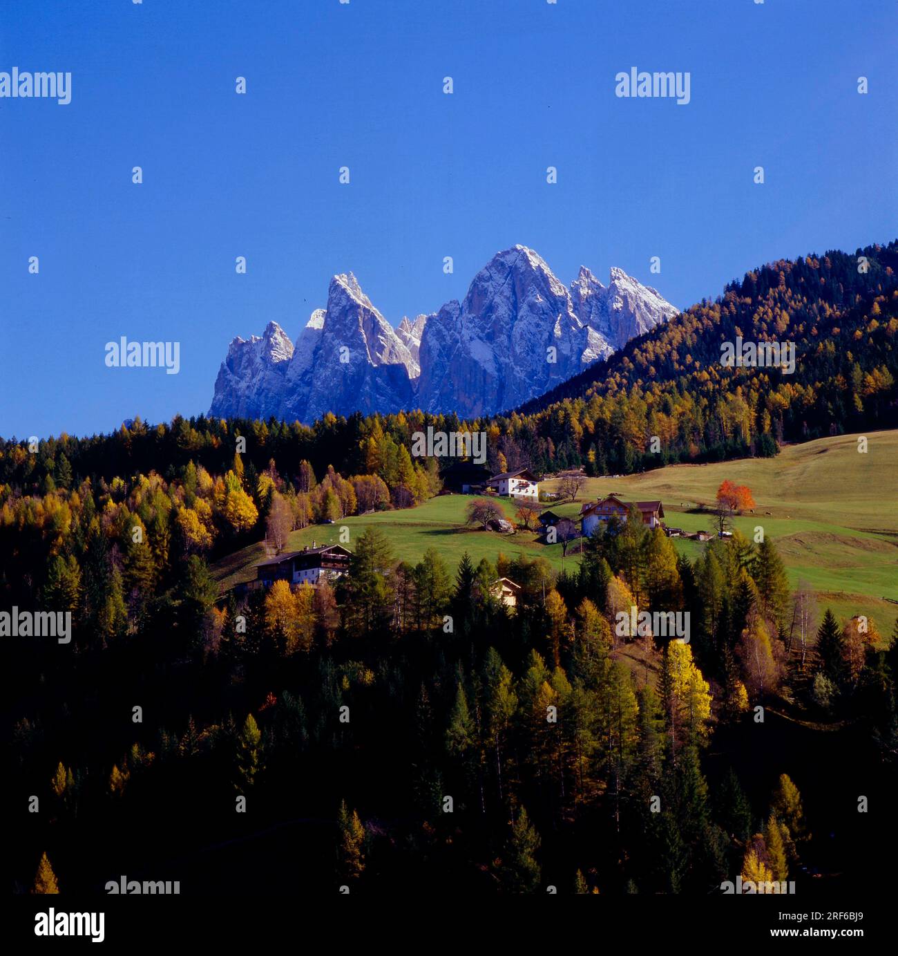 Mountain farms in the Villnoess Valley, above the Geisler peaksSouth ...