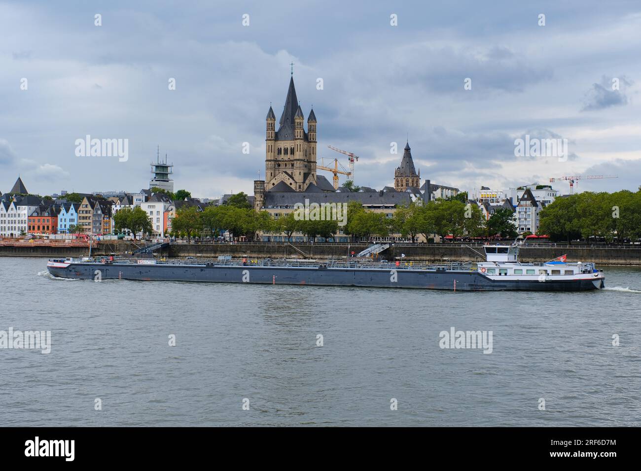 View over the Rhine with cargo ship, Cologne, Germany Stock Photo - Alamy