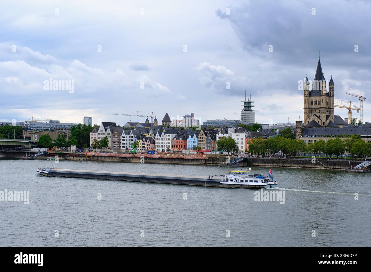 View over the Rhine with cargo ship, Cologne, Germany Stock Photo - Alamy