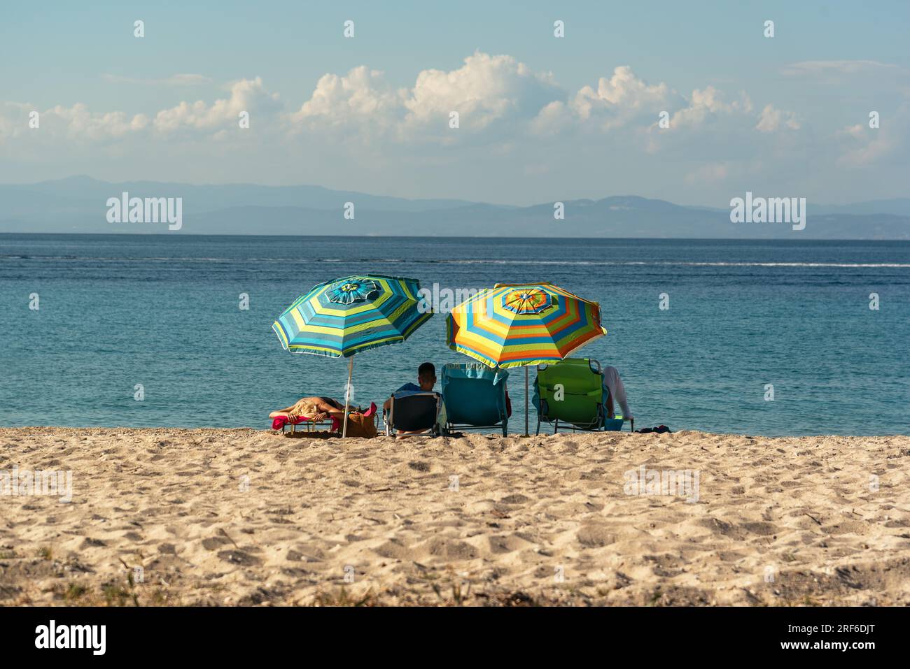 Two people with umbrellas on chair hi-res stock photography and images ...