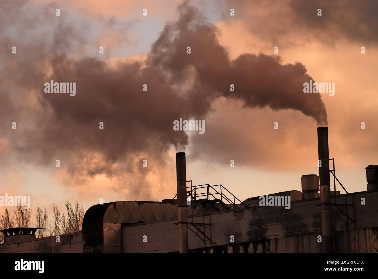 Dark smoke from a smokestack Stock Photo - Alamy