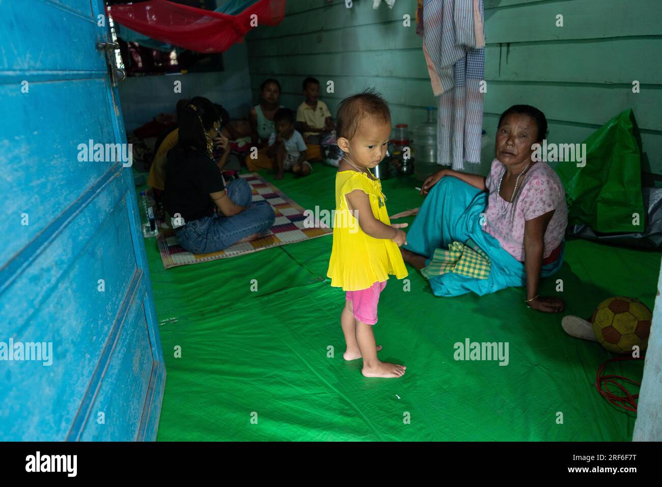 Meitei community man stays in a makeshift shelter after a mob burn ...