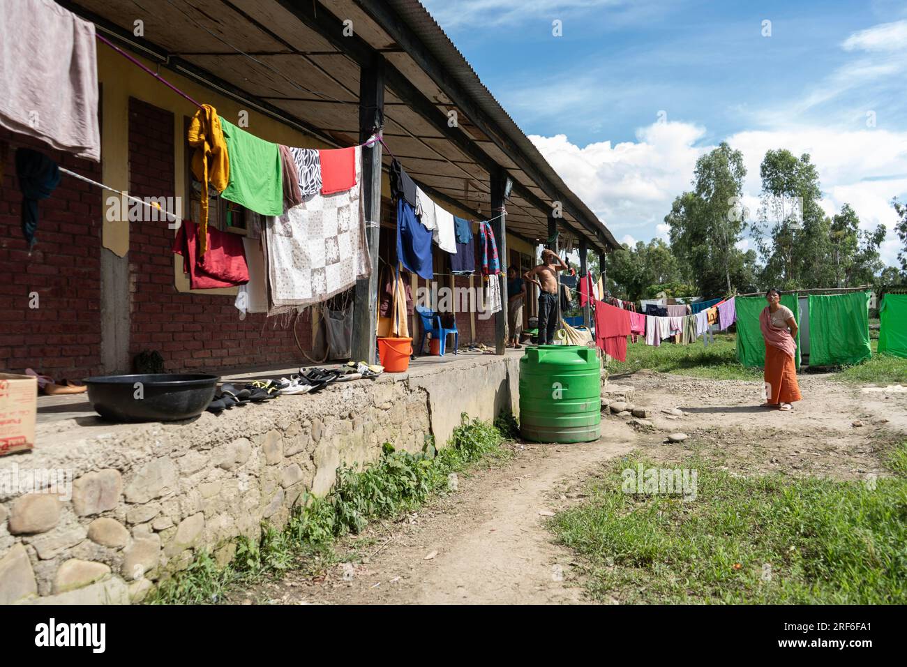 Meitei community man stays in a makeshift shelter after a mob burn ...