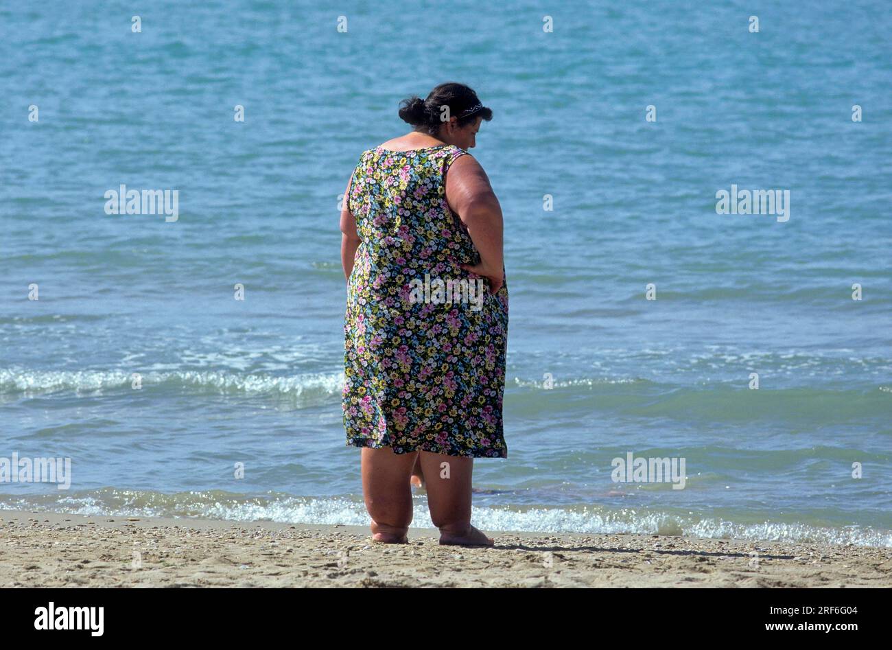 Fat woman on the beach Stock Photo - Alamy