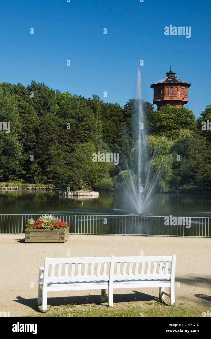 Old water tower, fountain at the moat, Wolfenbuettel, Lower Saxony ...