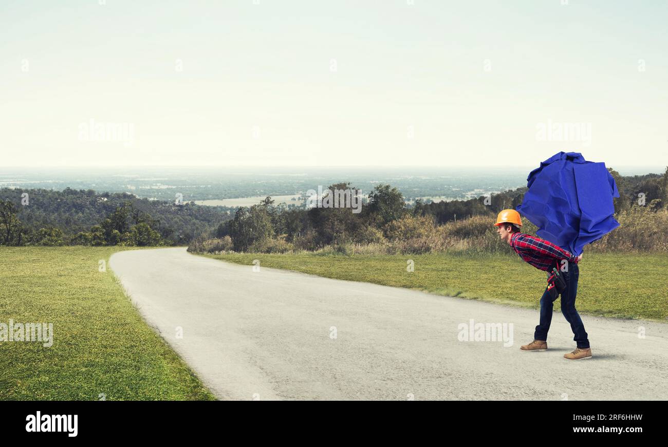 Engineer man carry load Stock Photo - Alamy