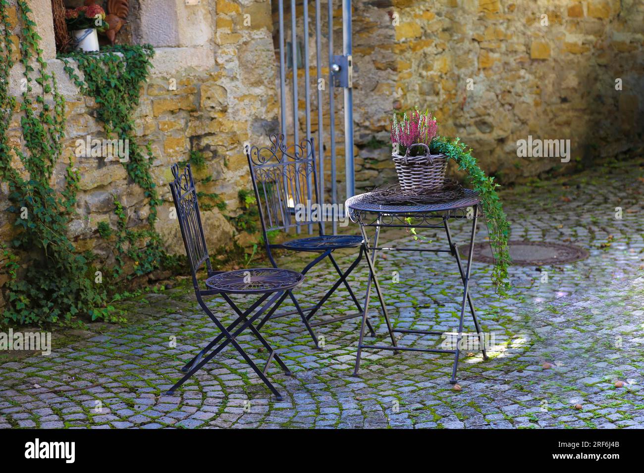 Still life at the castle wall, garden furniture, seating group, chairs ...