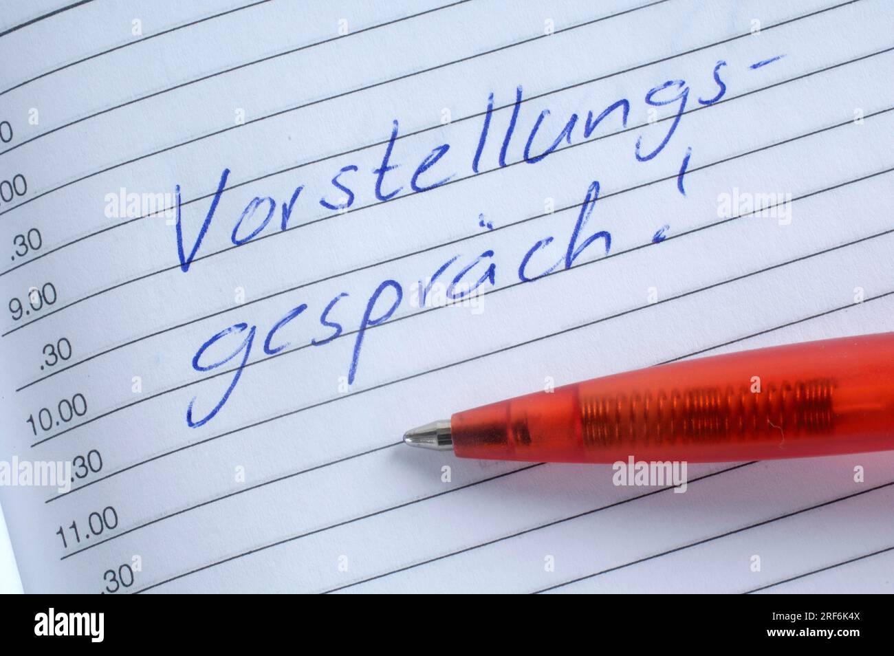 Appointment diary with ballpoint pen, entry for job interview ...