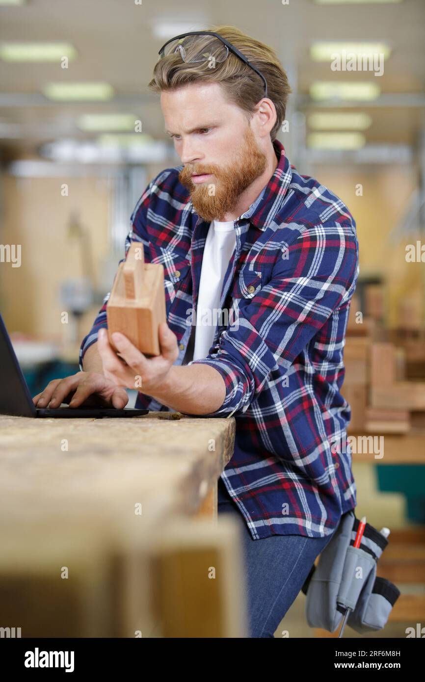 Carpenter standing in home workshop hi-res stock photography and images ...