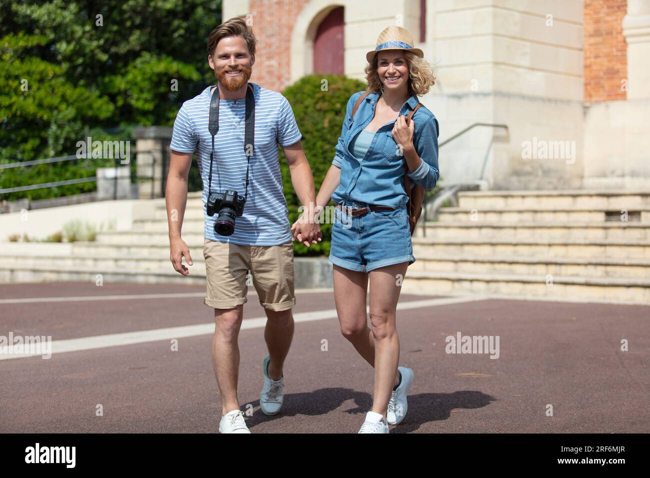 couple having a city break in summer Stock Photo - Alamy