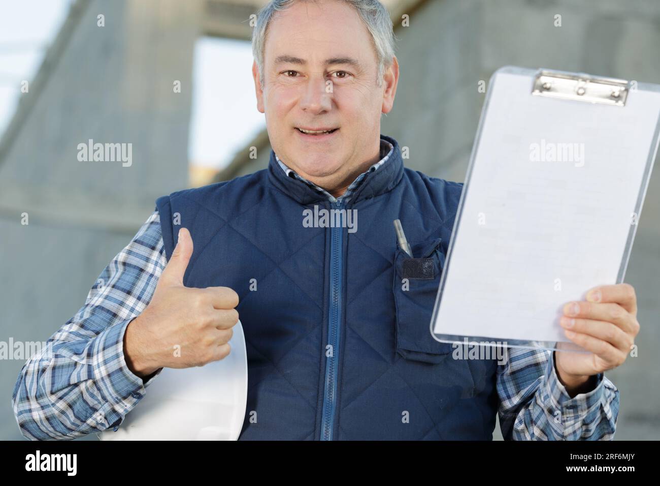 happy civil engineer showing thumb-up Stock Photo - Alamy